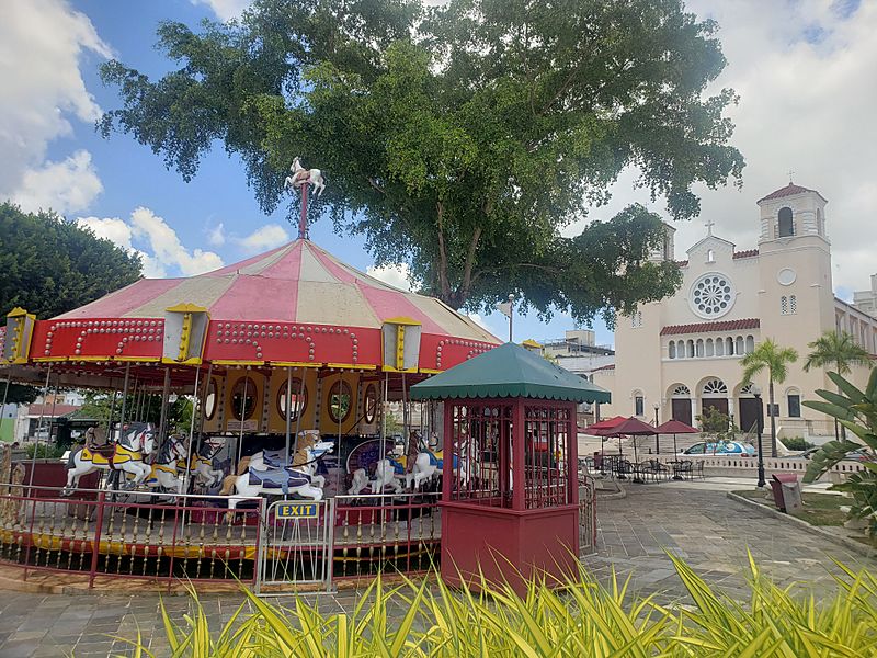 Image: Carousel and church at main plaza in Caguas, Puerto Rico