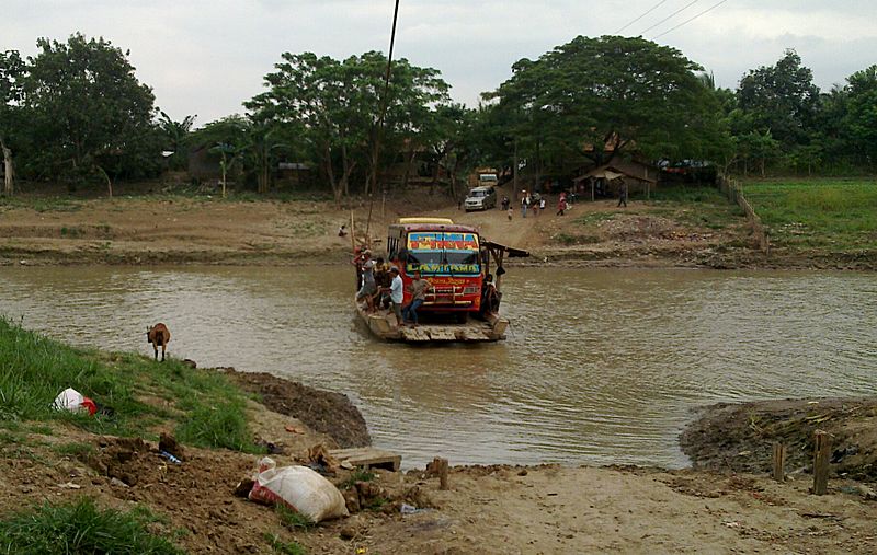 Image: Bus on raft at Citarum River, West java, Indonesia