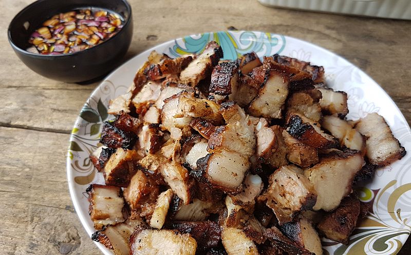 Image: Sinugba na baboy (inihaw na baboy) with dipping sauce, Philippines